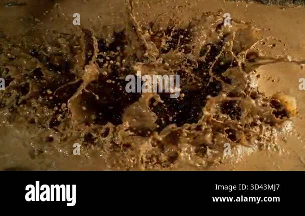 Super Slow Motion Shot of Mud Splashing , Top Shot , Filmed on High ...