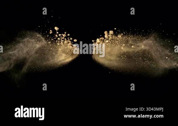 Super Slow Motion Shot of Soil Collision Isolated on Black Background ...