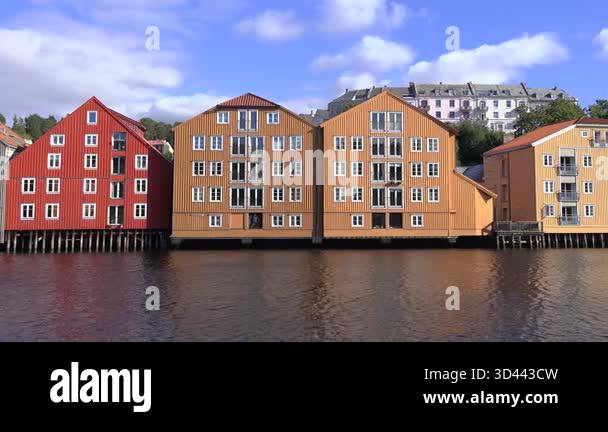 Beautiful riverfront buildings in Trondheim, Norway showcase colorful ...