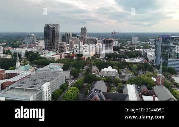Aerial 4K footage moving above Raleigh downtown, showing the city ...