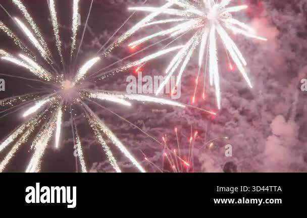 Real fireworks exploding in the sky during a celebration. Slow motion ...