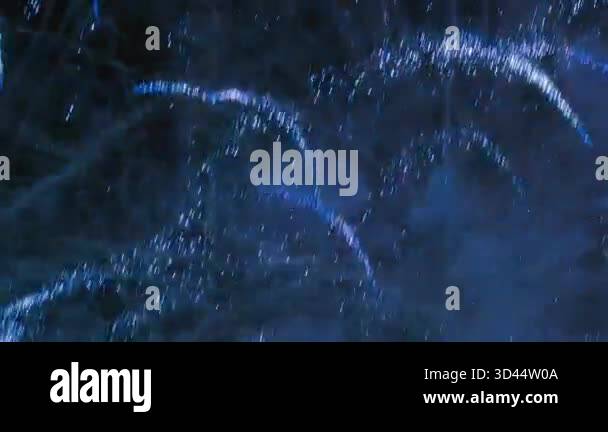 Close up of a fireworks show display on the night sky. Slow motion ...