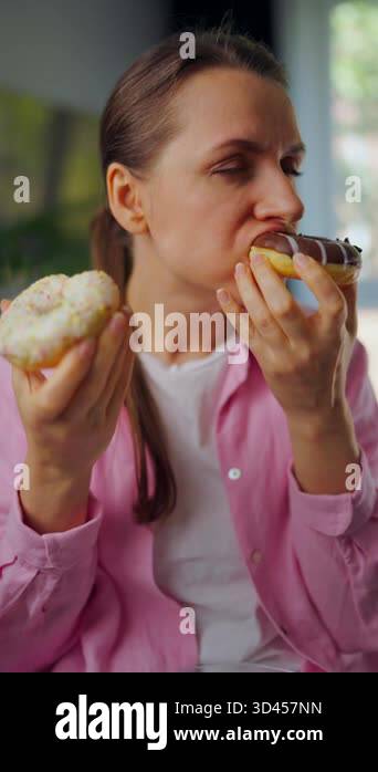 Binge eating concept. Attractive Caucasian woman with eating disorder ...