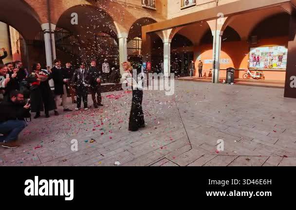 BOLOGNA, Italy, 17 March 2024 - A student celebrates her graduation at ...