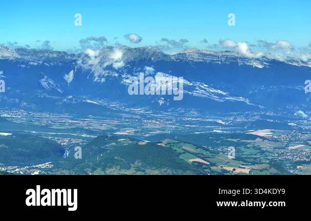 Aerial view of Grenoble city seen from Chamrousse mountain area in the ...
