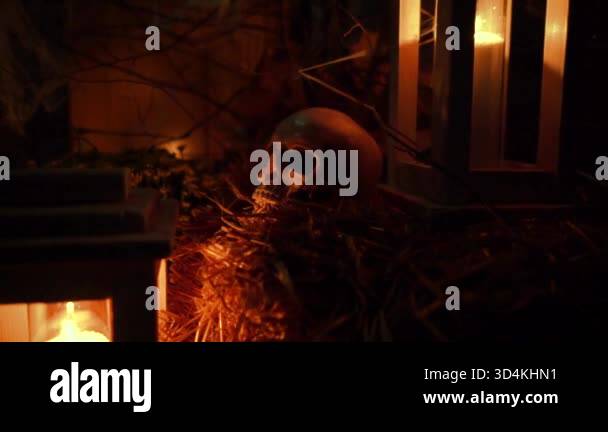 Dark room with candles, spiders, webs and a human skull. Horrible ...