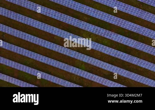 Rows of solar panels form a striking pattern as they capture sunlight ...