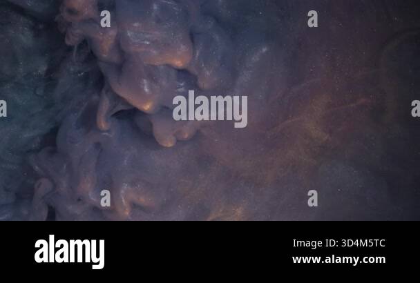 Smoke splash. Glitter fume pigment. Defocused blue purple color ...