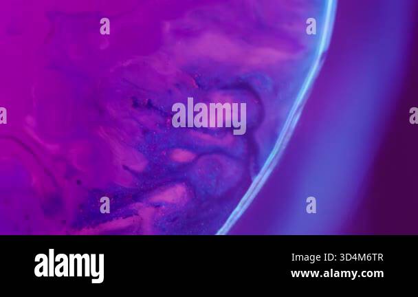 Fluorescent blob. Ink background. Defocused pink blue purple colorful ...