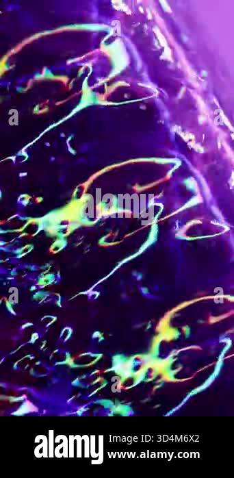 Vertical video. Twisting neon spill. Blur sparkle. Multicolored fluid ...