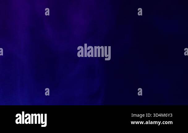 Swirling steam. Ink water. Defocused blue purple neon colorful smog ...