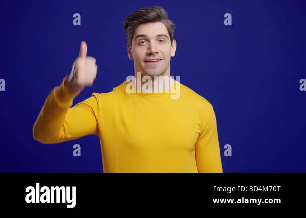 Positive man makes hand sign like, thumbs up gesture. Happy man ...