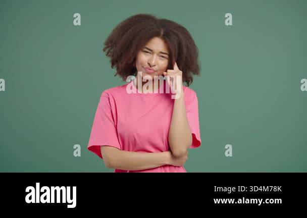 Smart young woman gesture-you, think about it. Student looking camera ...