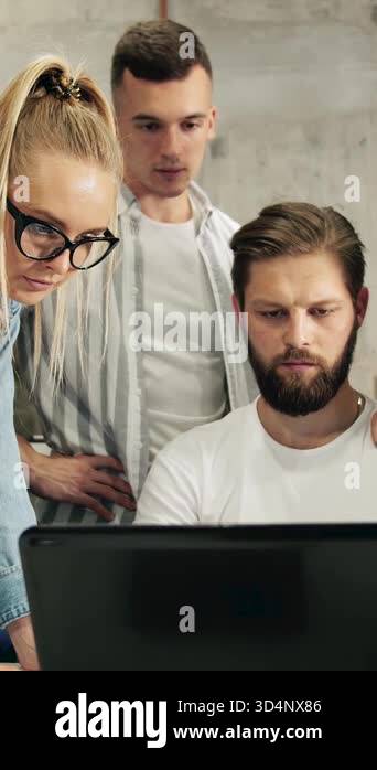 Team members collaborate on work tasks while exchanging ideas and ...