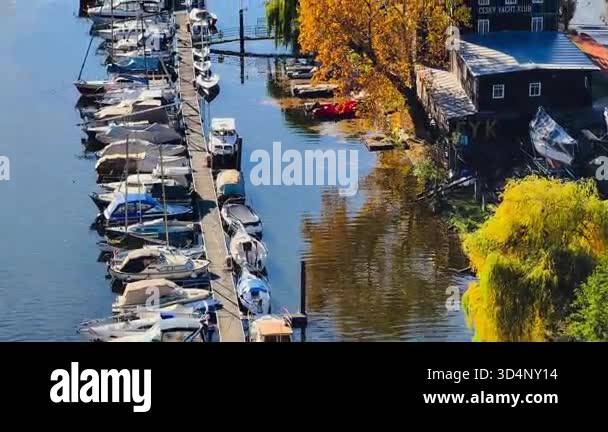4K Aerial Drone Marina Boat Dock Autumn Foliage Yachts Moored ...