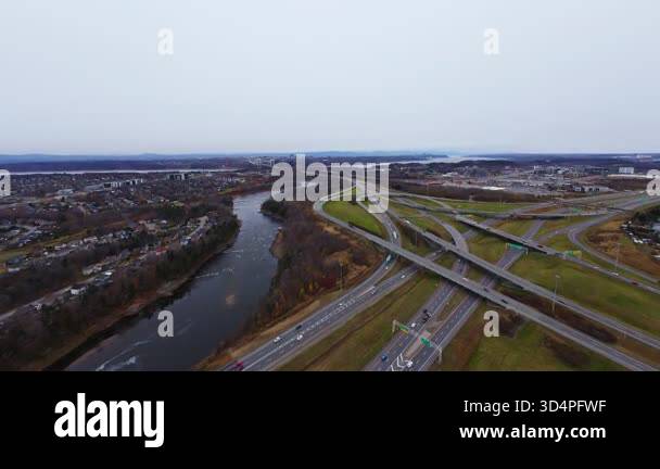 4K cinematic drone view of Quebec transport system with intersecting ...