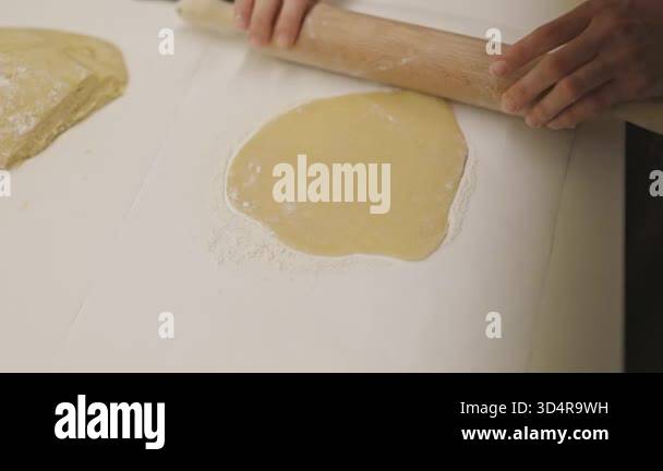 Female baker rolling out puff Stock Videos & Footage - HD and 4K Video ...