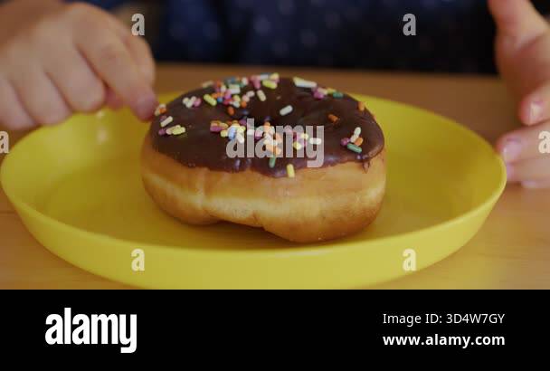 Chocolate donut in child Stock Videos & Footage - HD and 4K Video Clips ...