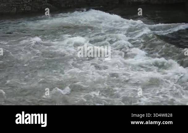 close-up of a strong current in a river with wave formation Stock Video ...