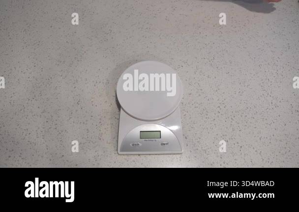 Empty kitchen counter, then unrecognizable female hands place kitchen ...
