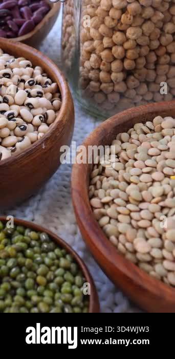 Close up view of various types of legumes, including lentils, chickpeas ...