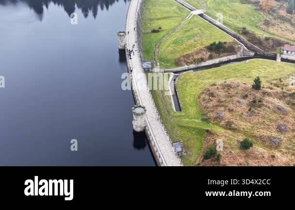 serene water retention structure scene, tranquil dam with curved ...