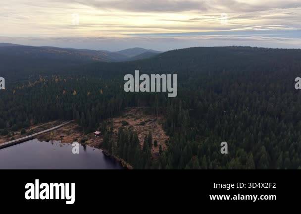 High vantage point, Sunset over layered hills and reservoir, Serene ...