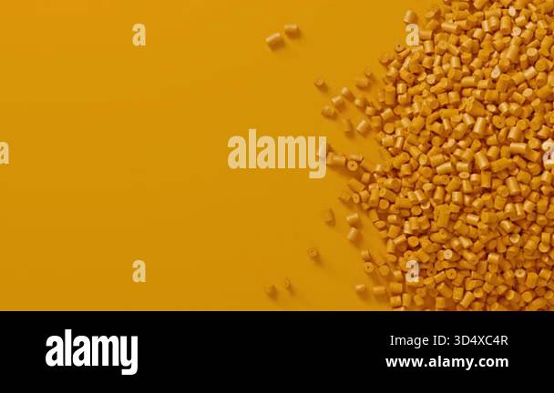 Closeup top view on yellow plastic polypropylene granules heap rotating ...