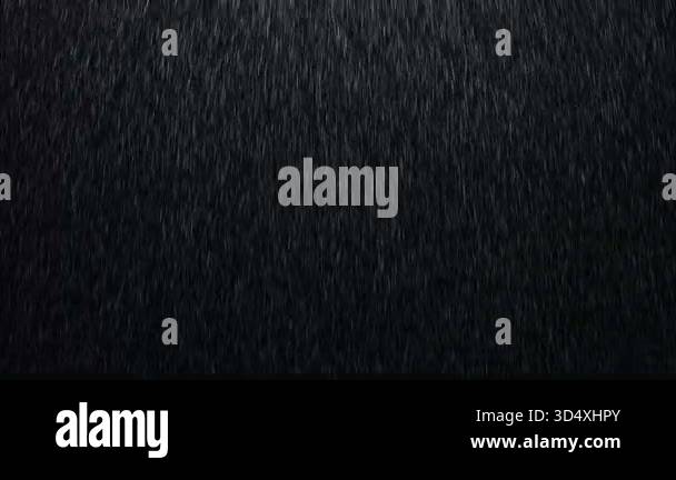 Dark realistic rain falling on a black background. Seamless loop ...