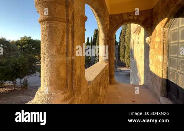 Early morning light shines on Saint Francis Monastery in Rodos. The ...