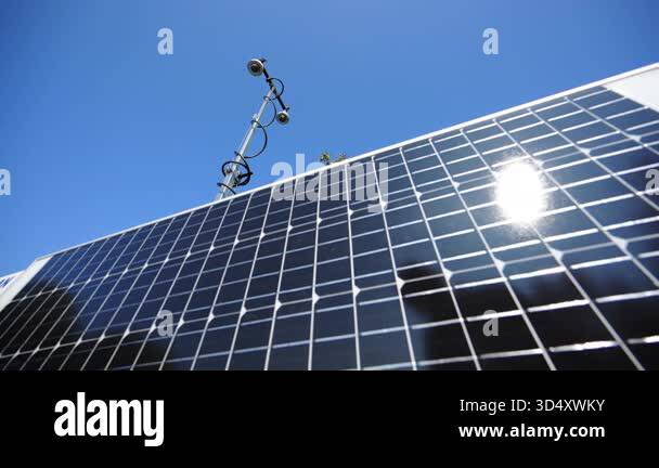 Close up of mobile police surveillance tower with solar panel and ...