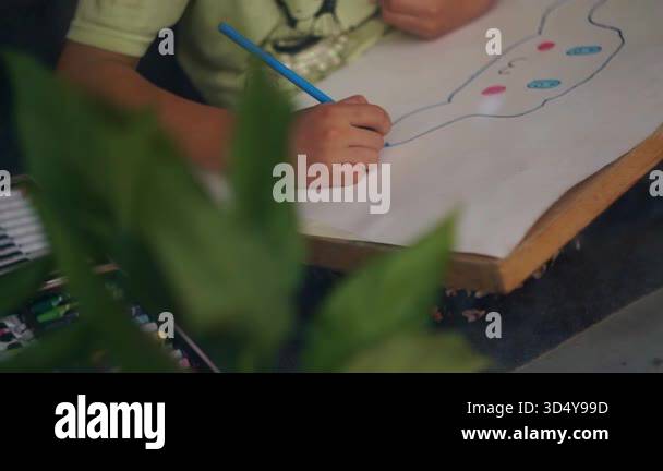 A girl sits in her room and draws Stock Video Footage - Alamy