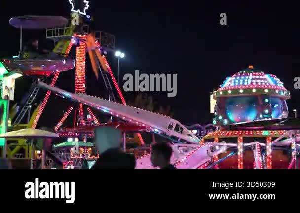 Rome, italy 27 october 2025: thrilling fairground attraction with ...