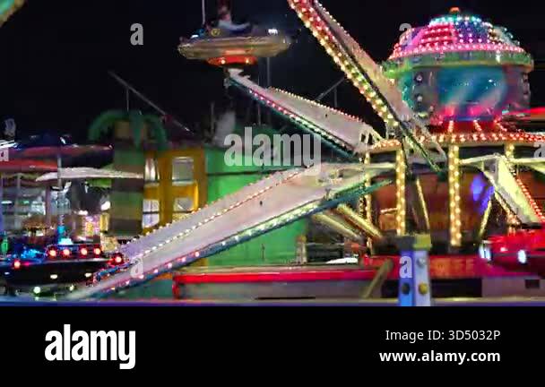 Rome, italy 27 october 2025: colorful spinning carousel ride with ...