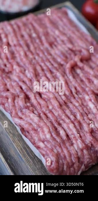 Raw ground beef or pork, fresh meat for burgers or other dishes. Raw ...
