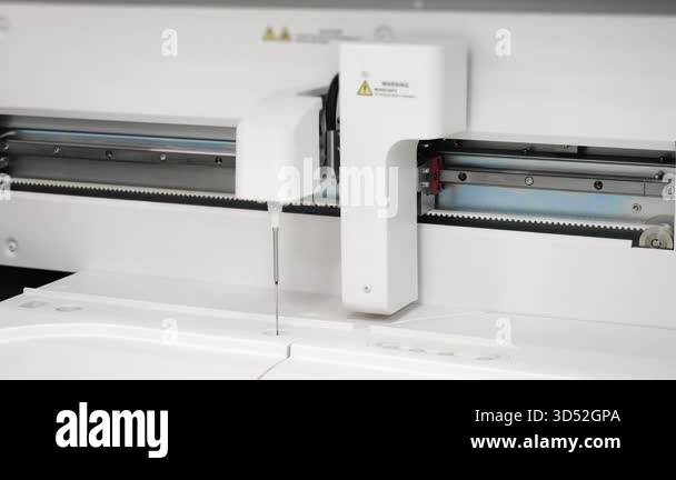 Automatic laboratory analyzer performs precise movements and sample ...