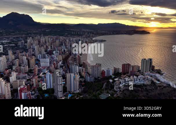 dusk harbor panorama, vibrant seaside scene featuring mountain outline ...