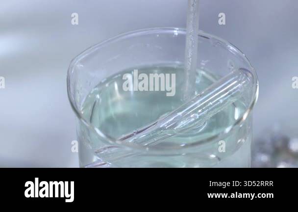 Chemical reaction in a beaker with zinc and acid Stock Video Footage ...