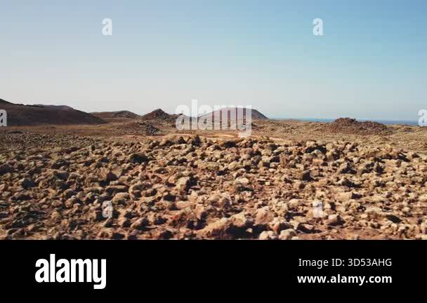 Expansive rocky terrain stretches across Stock Videos & Footage - HD ...