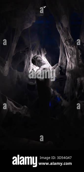 Self-isolation. Scared suffering woman tangled in huge trapped in ...