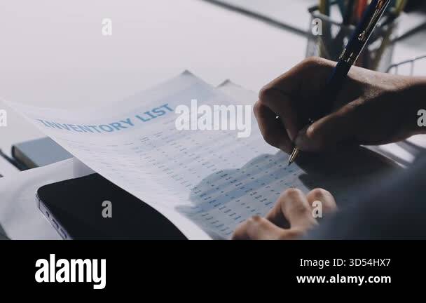 man writing list with pen Stock Video Footage - Alamy