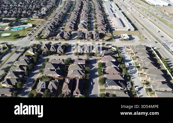 Upscale Castle Hills neighborhood with straight rows of pitched-roof ...