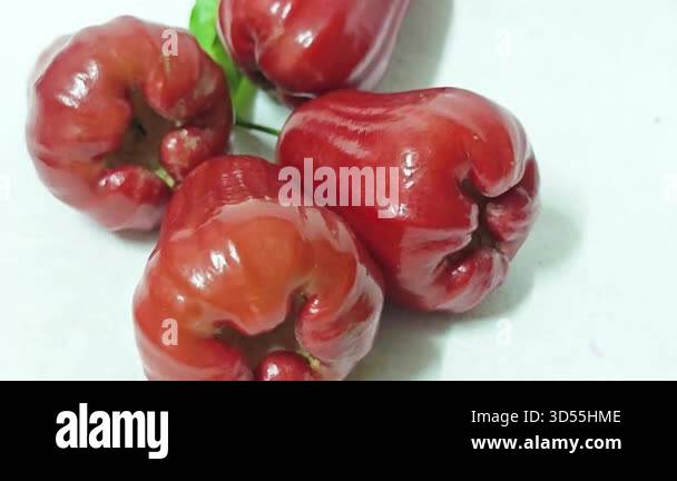 Juicy red rose apples isolated on white background Stock Video Footage ...