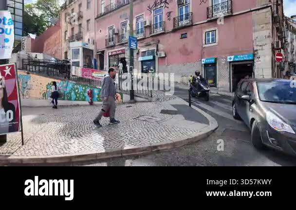 pov view through tram 28 window in Lisbon, Portugal historical district ...