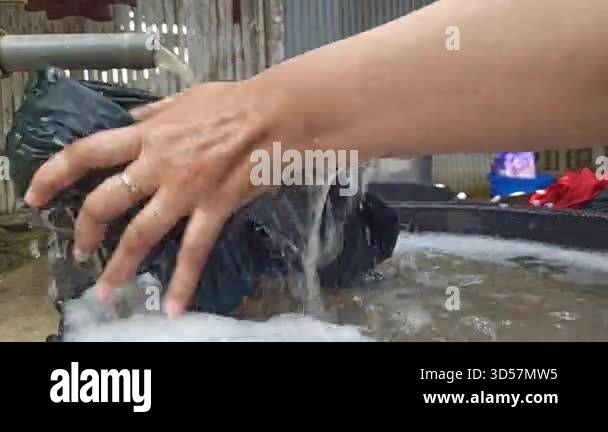 A simple water tap providing daily water needs, installed outdoors ...