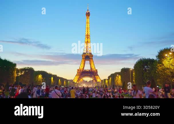 Paris, France - 25.08.2025: Eiffel Tower In the evening with beautiful lighting creating a ...