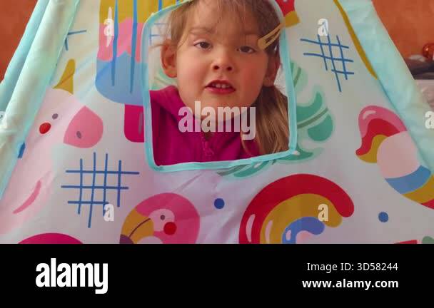 A sweet little girl expresses dissatisfaction and screams in aggression ...