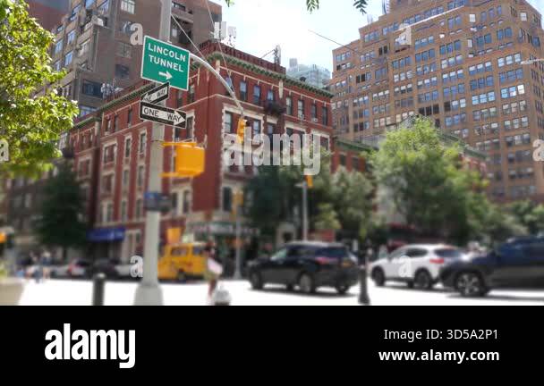 Manhattan Midtown street New York City, United States. Red brick house ...