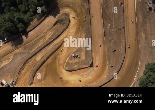 Thrilling aerial top down view of professional riders competing in an ...