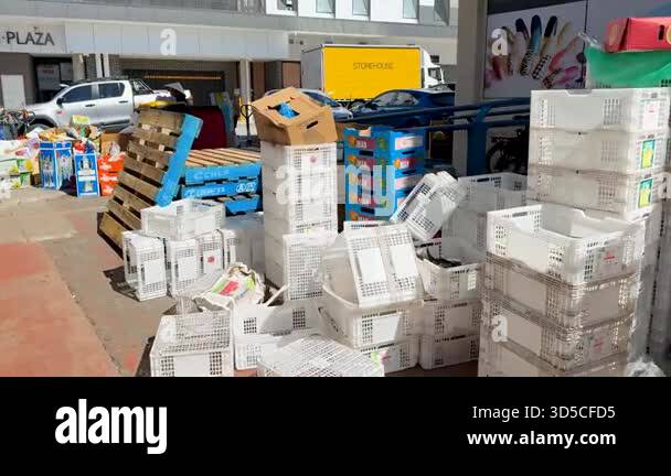Discarded boxes and pallets at fruit market Stock Video Footage - Alamy